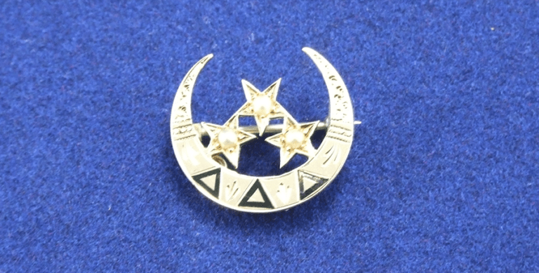 The History of Our Beloved Badge - Tri Delta